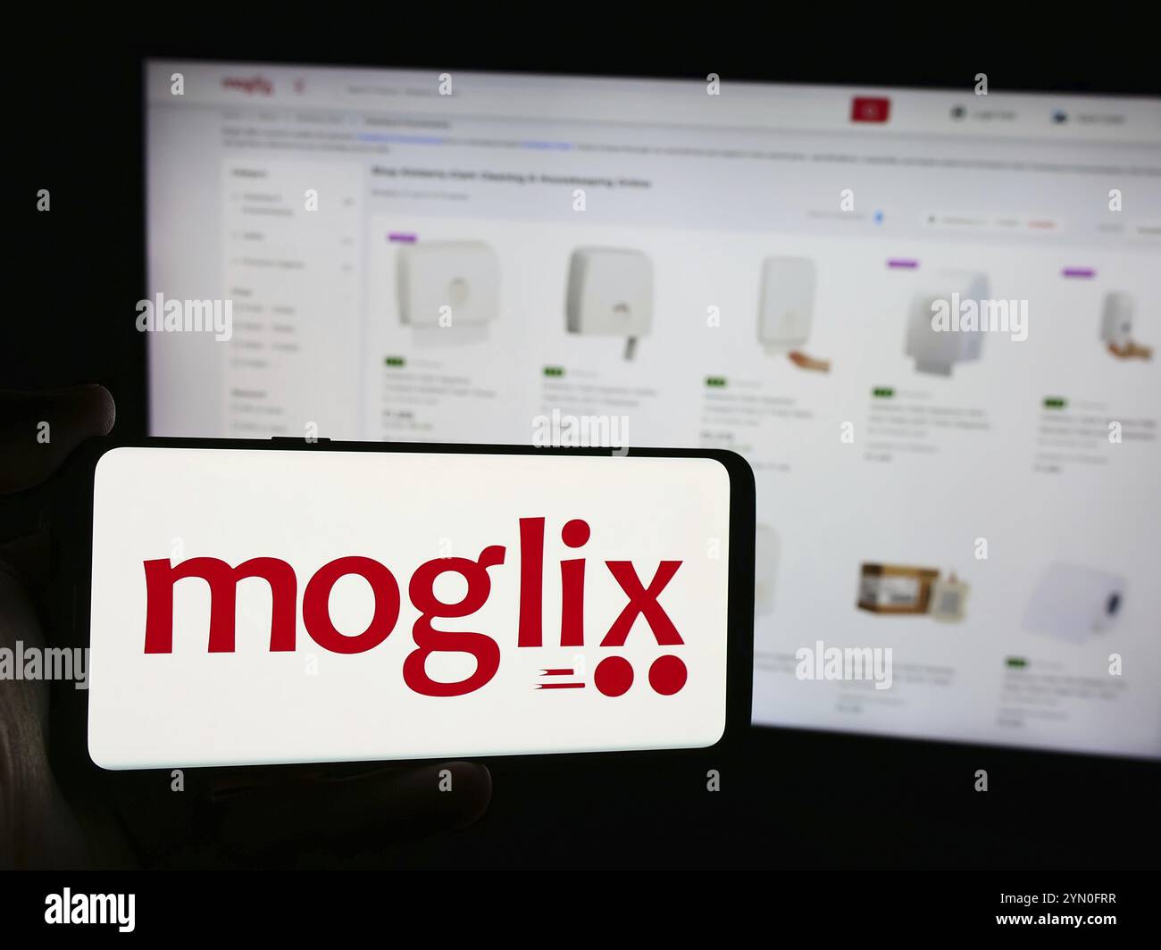 Stuttgart, Germany, 07-11-2024: Person holding mobile phone with logo ...