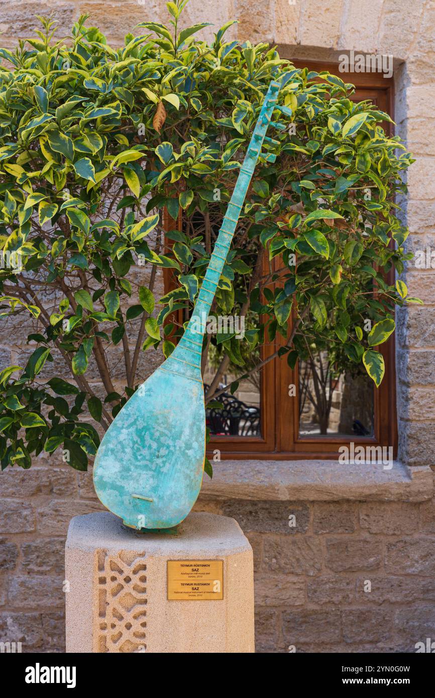 A bronze sculpture by Teymur Rustamov of a traditional Azerbaijani ...