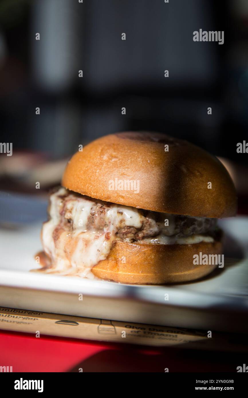 The "Truffle Burger" comprised of their famous blend of beef, roasted ...