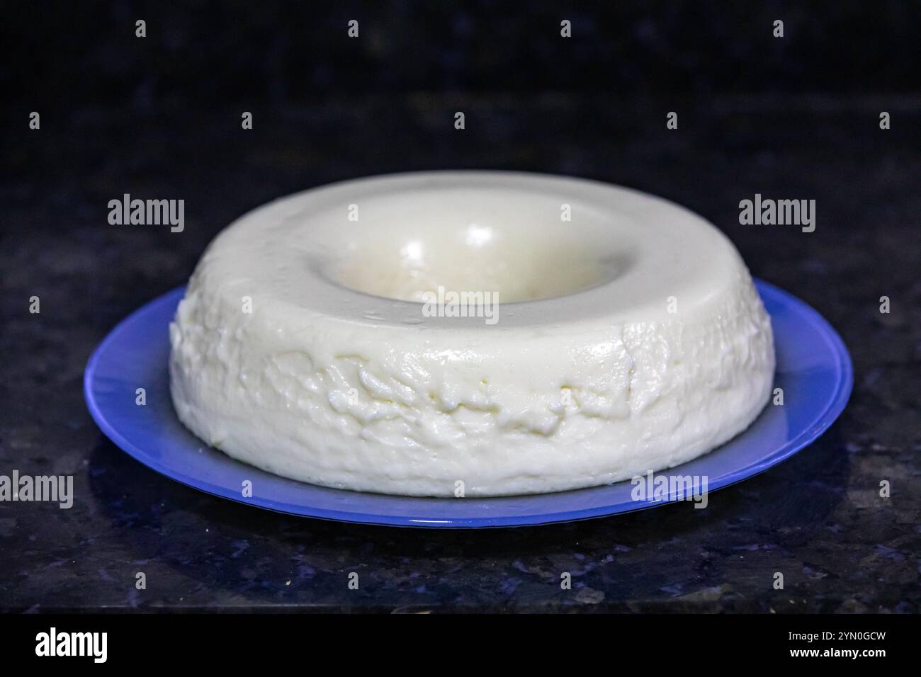 Traditional Brazilian coconut flan dessert known as manjar branco ...