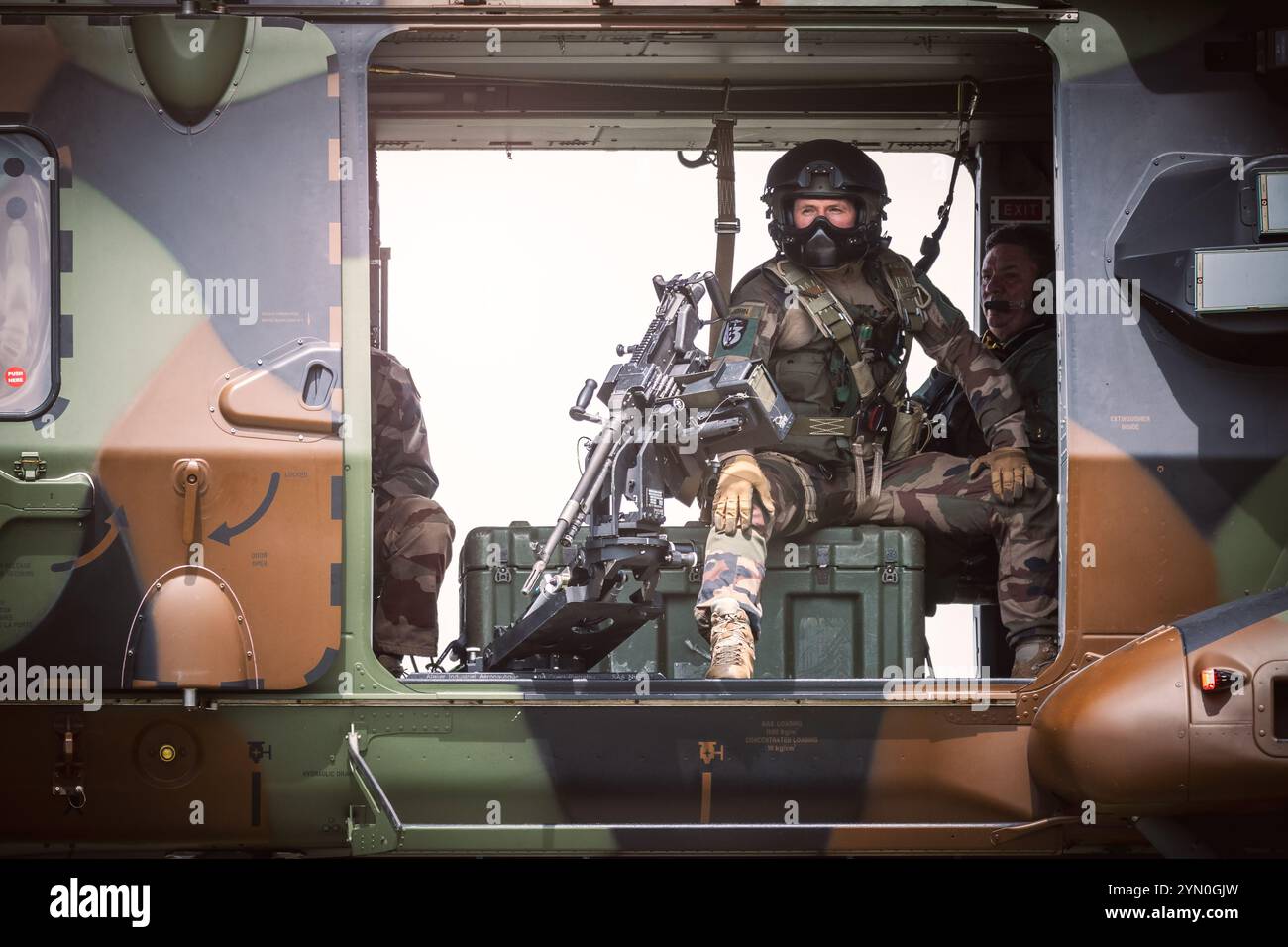 French army soldier door gunner in a NH90 helicopter. Schleswig-Jagel ...