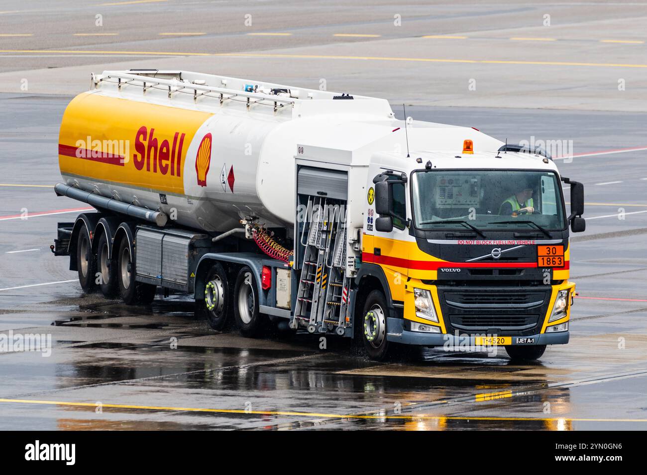 Volvo fuel truck Shell kerosine refueling vehicle driving on the apron ...