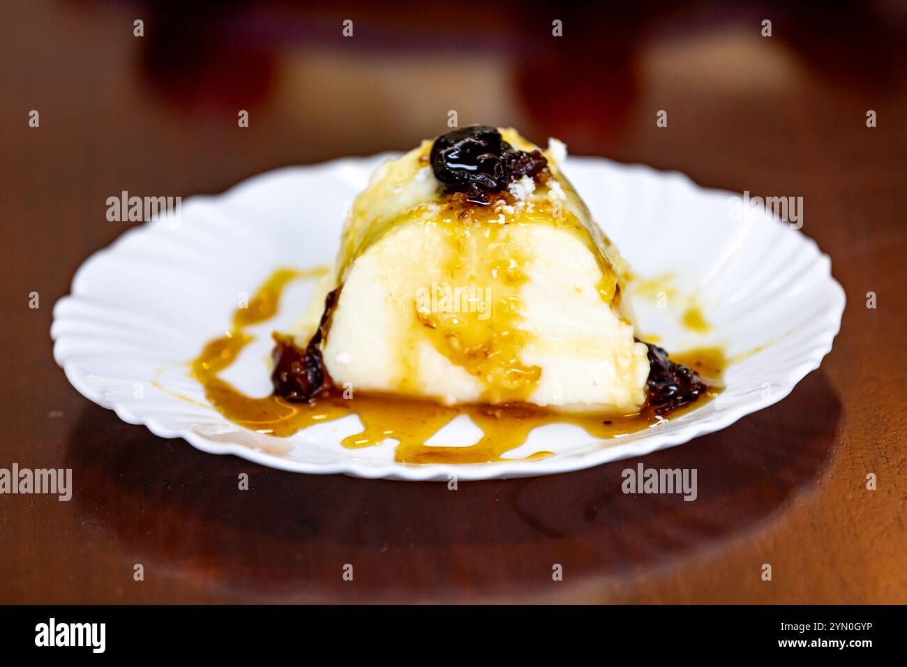 Traditional Brazilian coconut flan dessert known as manjar branco ...