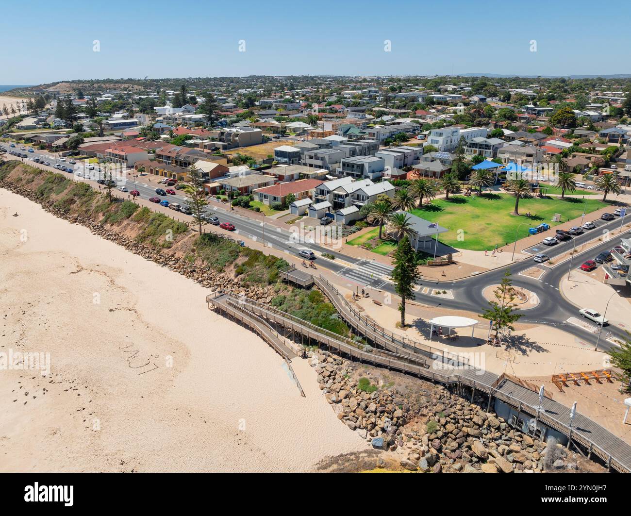 Aerial view of coastal esplanade and boardwalk ramp at Christies Beach ...