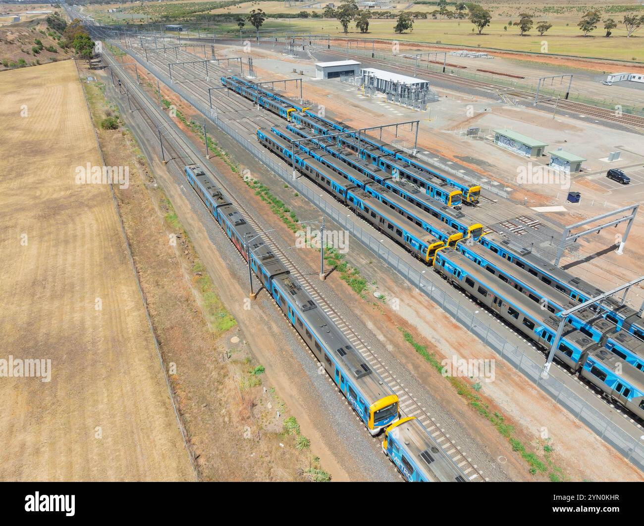 Aerial view of train carriages lined up at a transport depot at Calder ...
