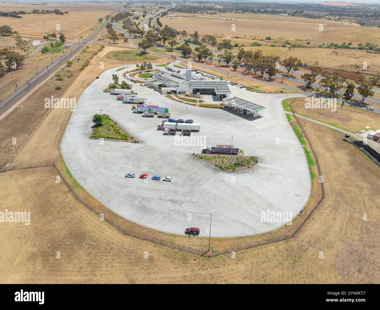 Aerial view of trucks and trailors parked at a truckstop at Calder Park ...