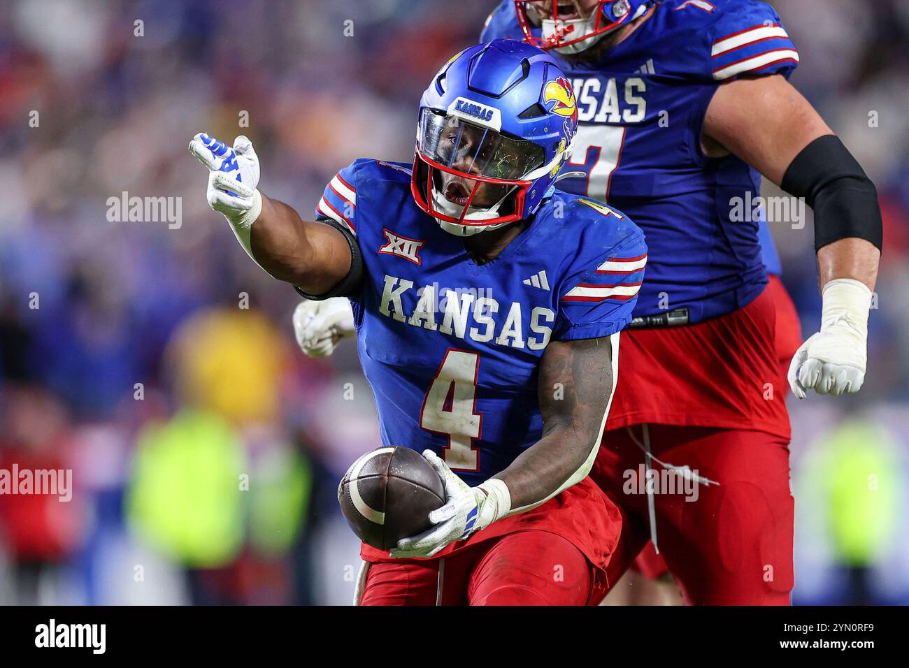 November 23, 2024: Kansas Jayhawks running back Devin Neal (4) reacts ...