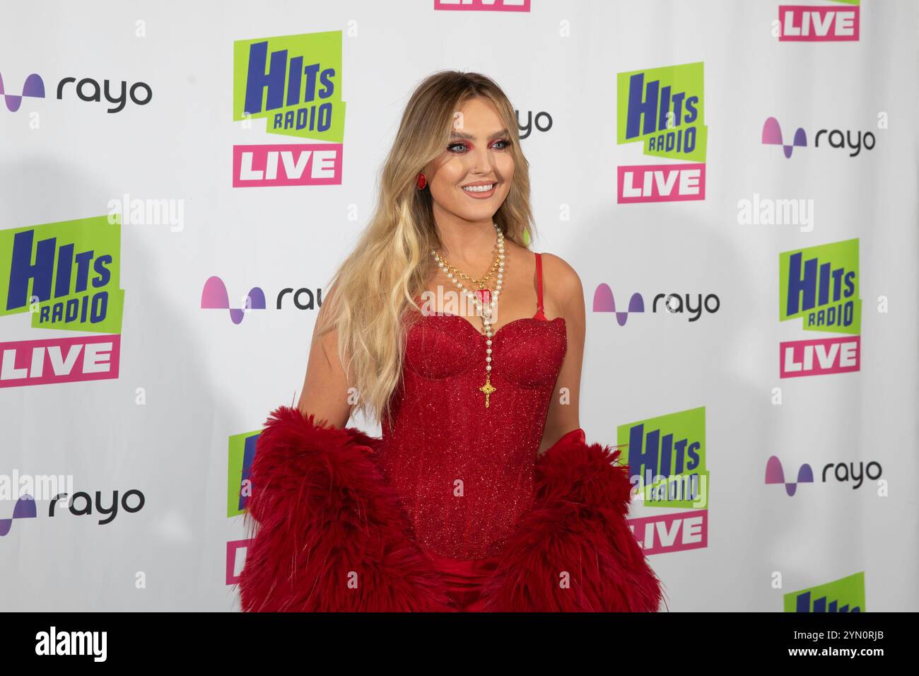 Manchester, England, 24th November, 2024. Perrie attending HITS Radio ...