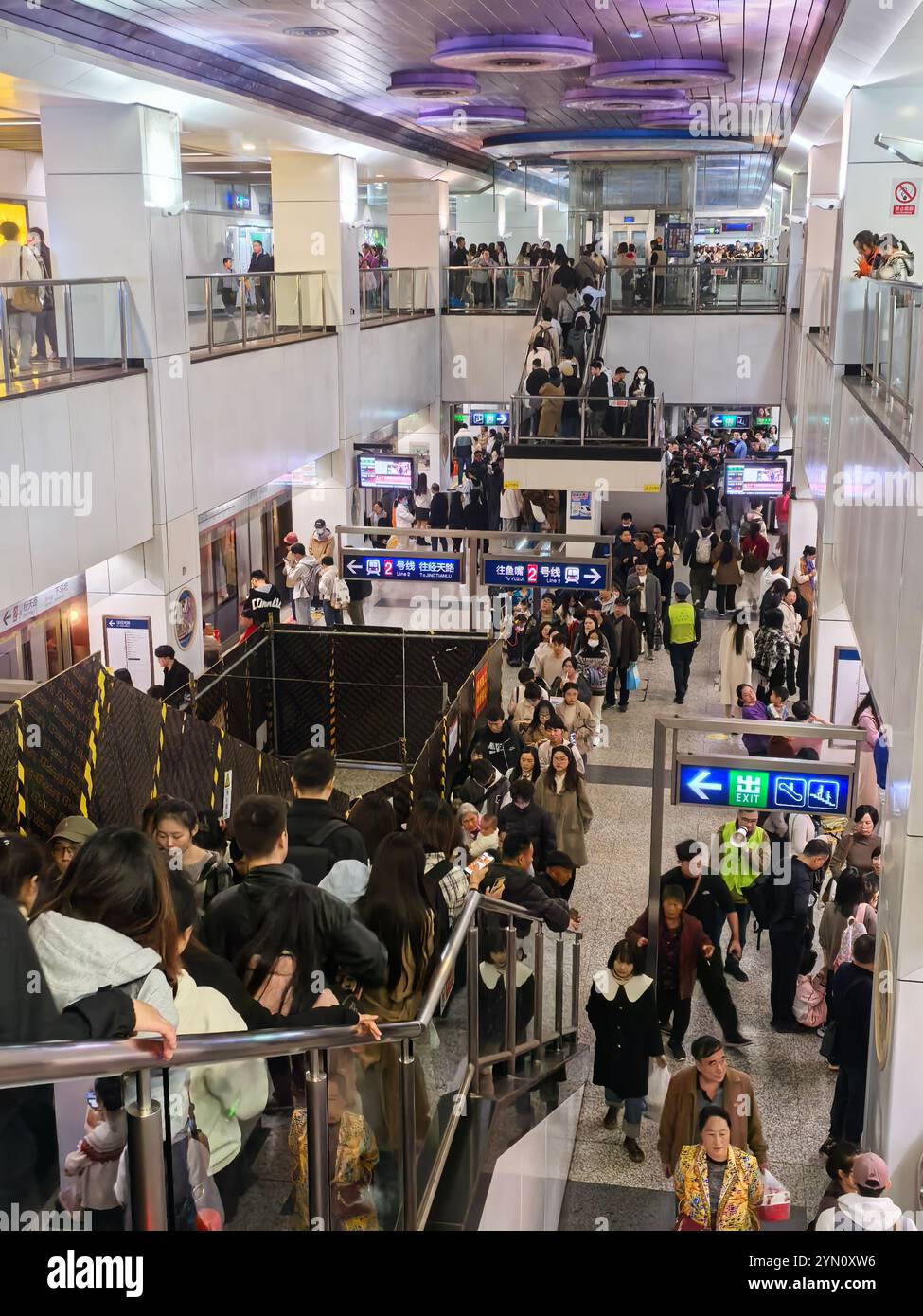 Tourists crowd the subway Line 2's MUXUYUAN Station in Nanjing, east ...
