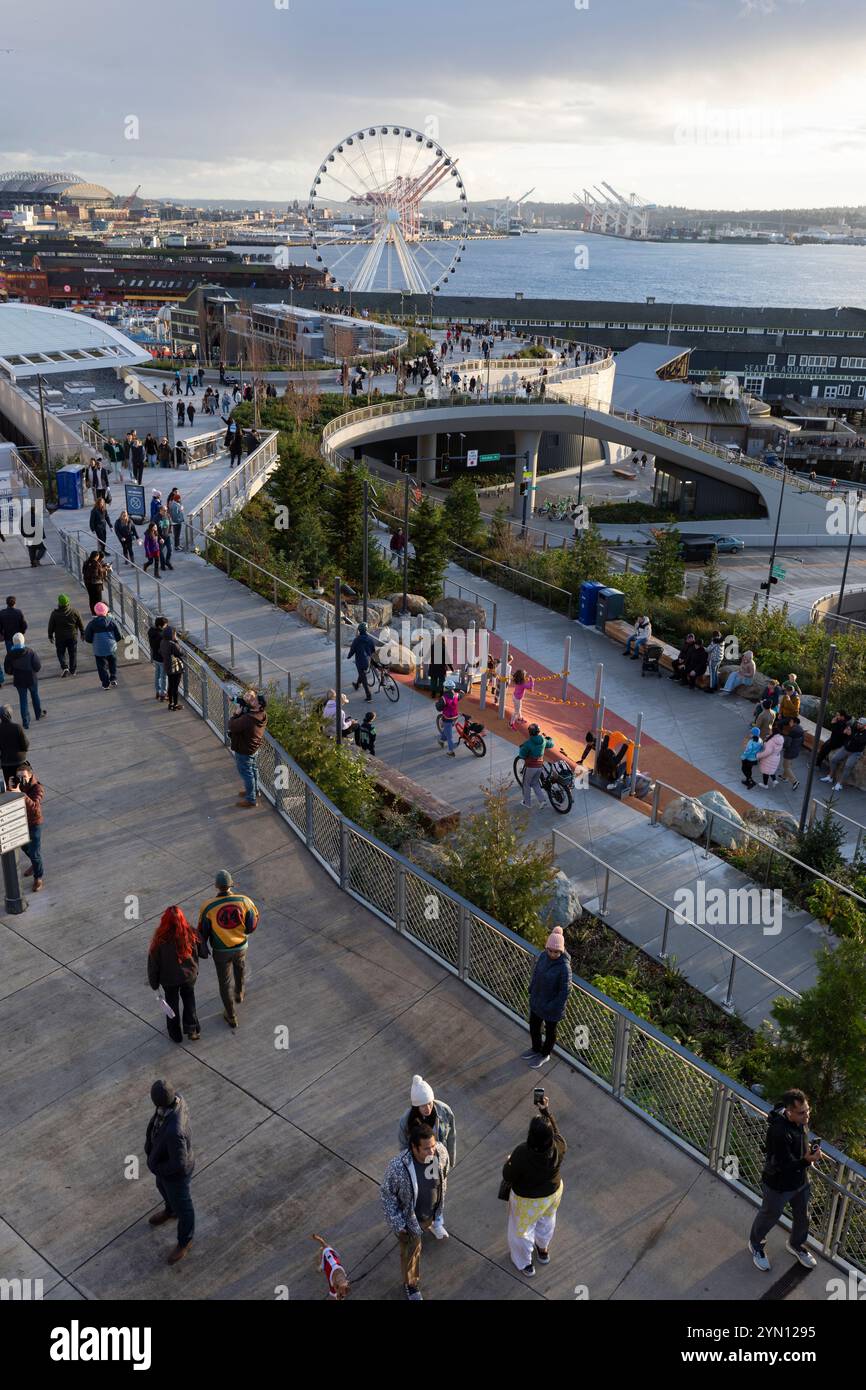 Visitors enjoy sunset along the waterfront at Seattle's new Overlook ...