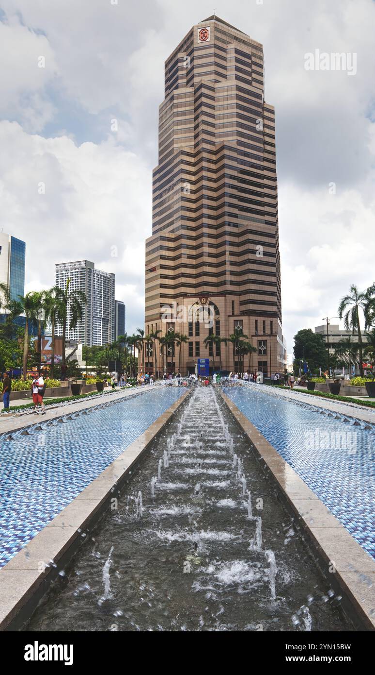 Tall tower behind a water feature in Kuala Lumpur, Malaysia's capital ...