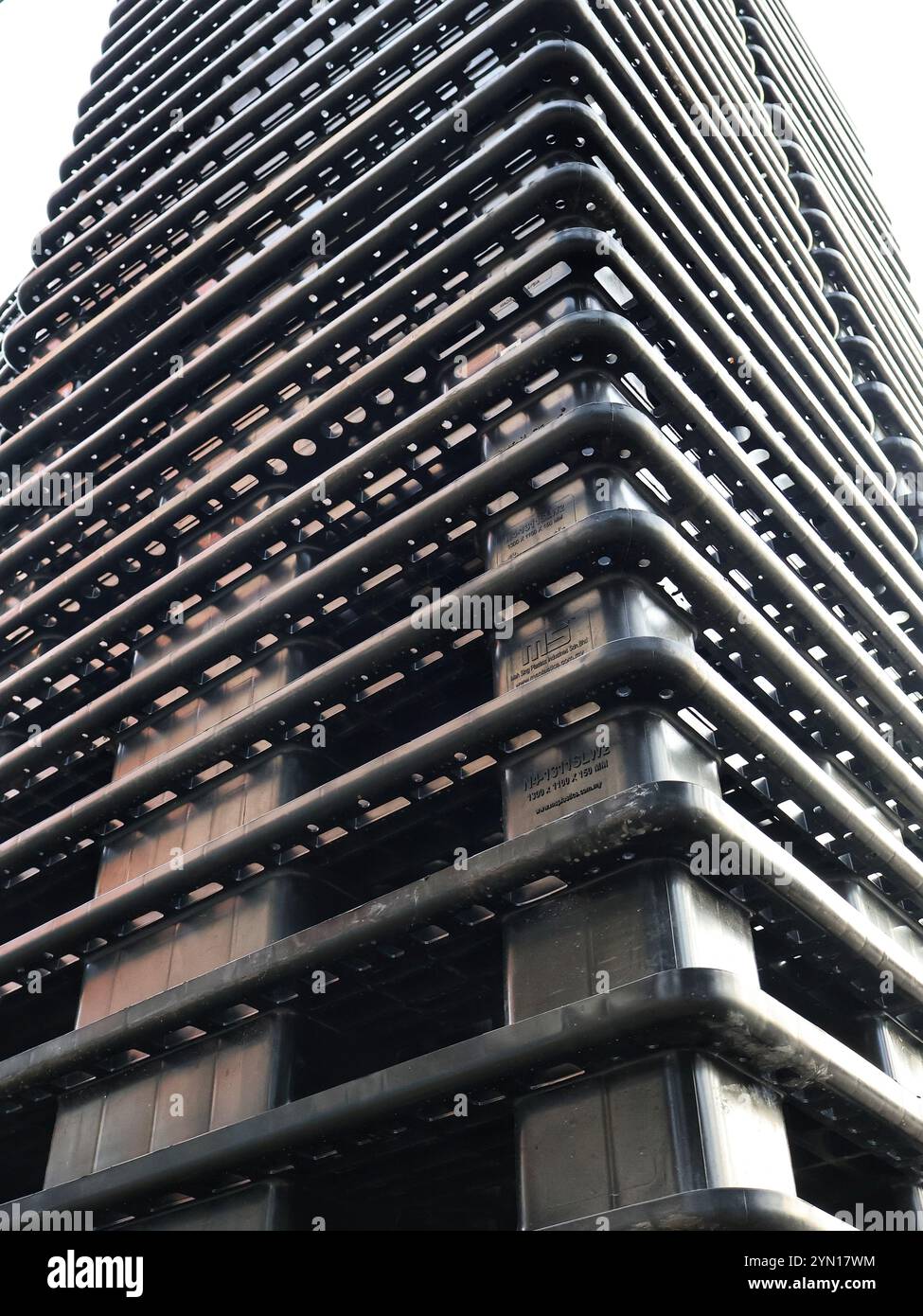 Balikpapan-East kalimantan November 23,2024 Stack of many black Plastic ...