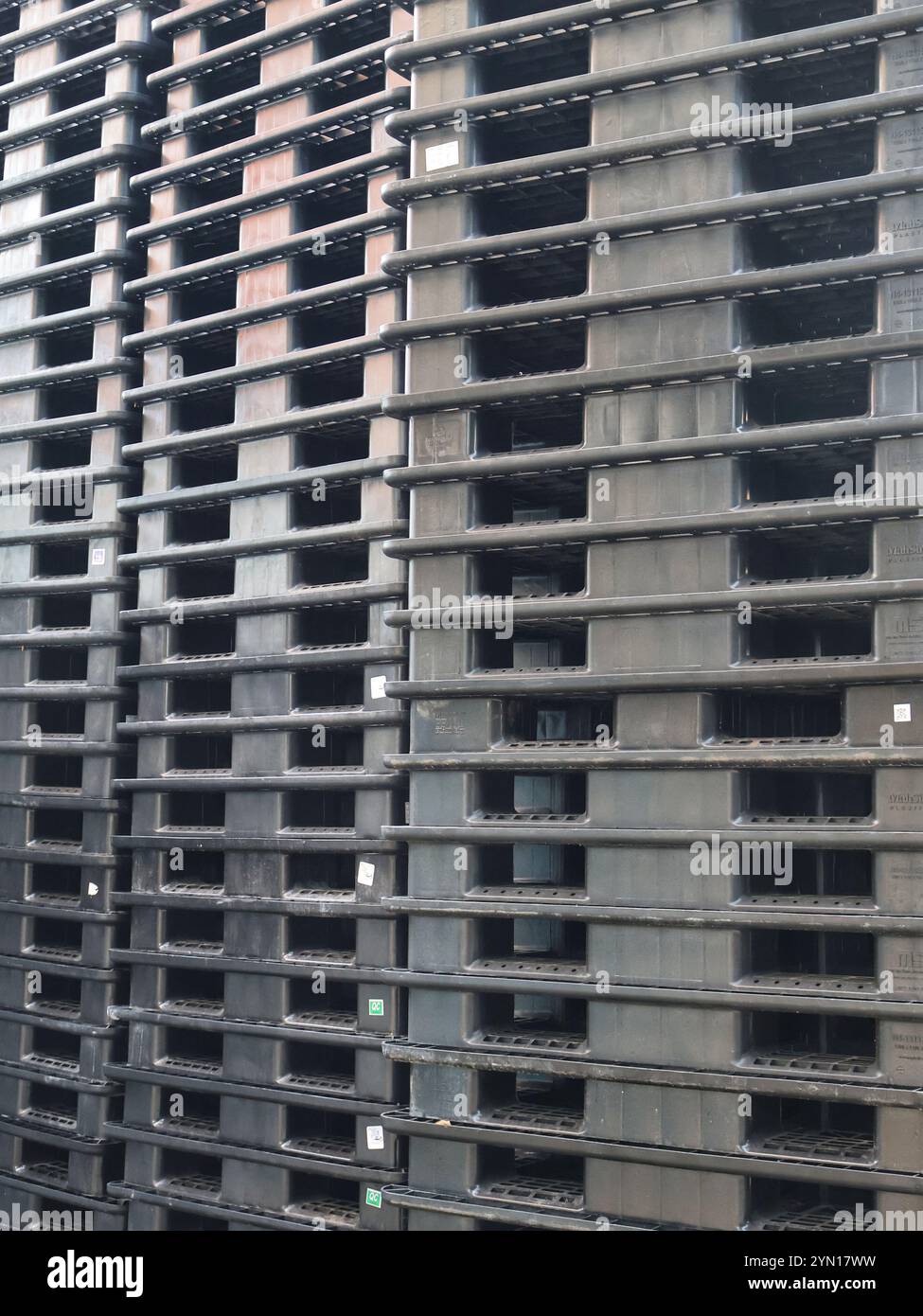 Balikpapan-East kalimantan November 23,2024 Stack of many black Plastic ...