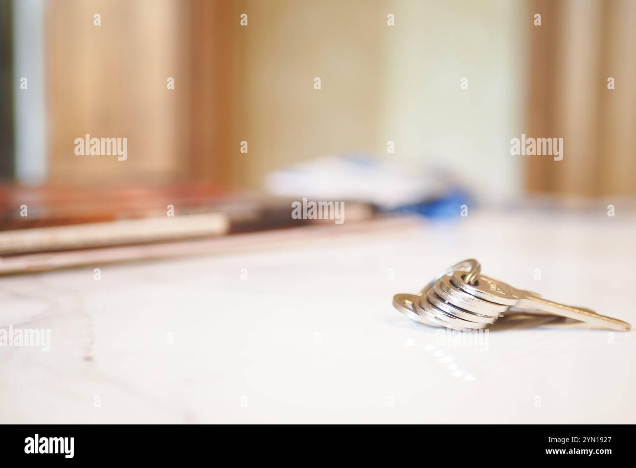 house keys on the ring on table in a room. To forget keys at home ...