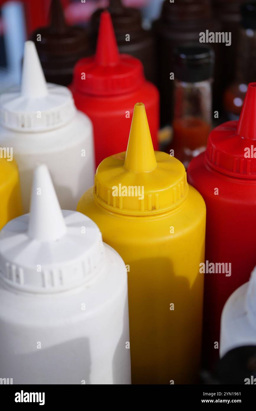 Explore a variety of condiment bottles like ketchup, mustard, and other ...