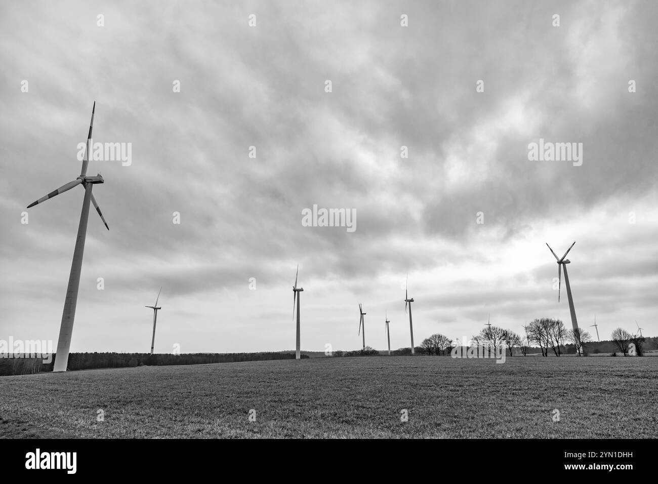 Windmill in rural area. offshore wind park. Wind Turbines Farm ...