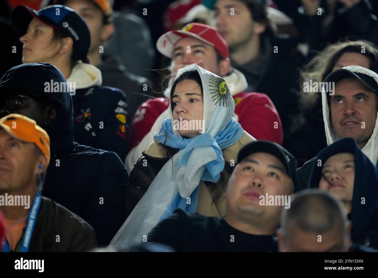 Fans watch the F1 Las Vegas Grand Prix auto race, Sunday, Nov. 24, 2024 ...