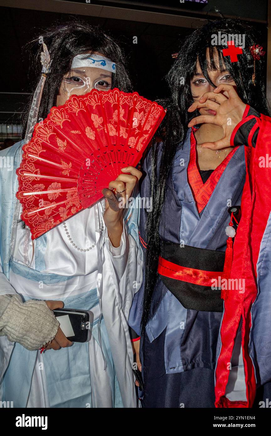 Two young female cosplayers in costumes seen during "Heroes Dutch Comic ...