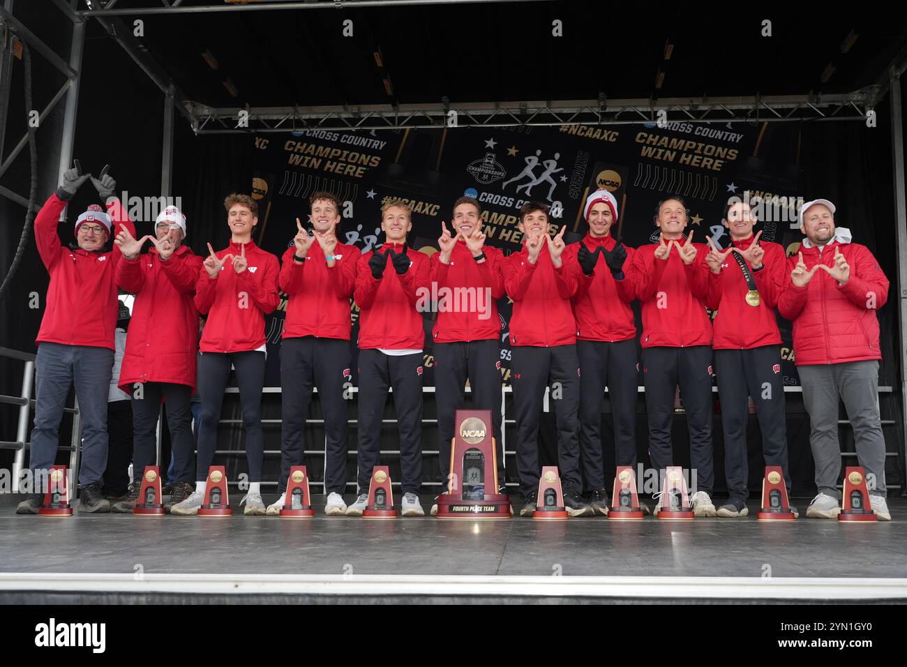 The Wisconsin Badgers men's team including coach Mick Byrne, Christian ...