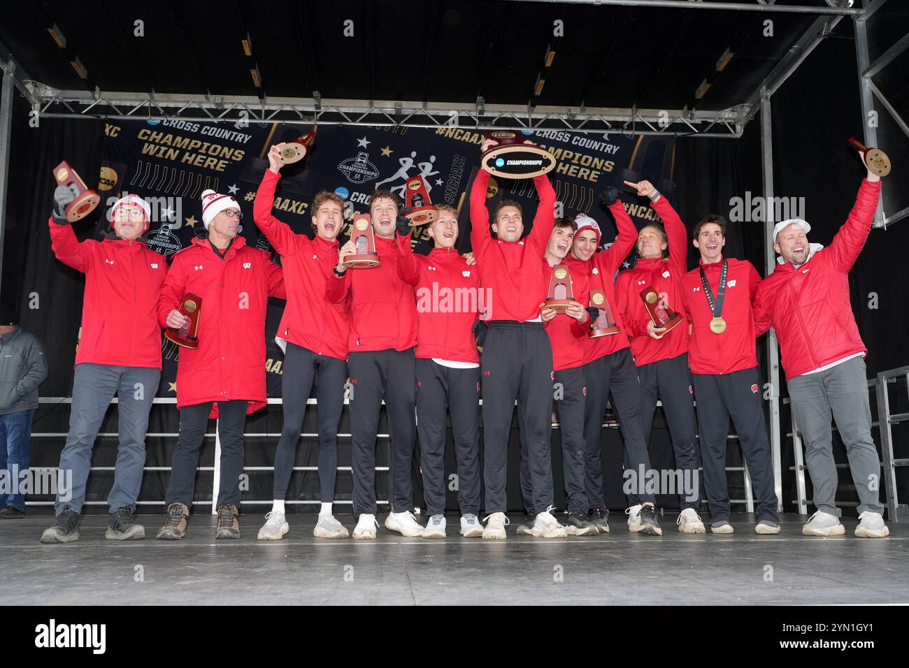 The Wisconsin Badgers men's team including coach Mick Byrne, Christian ...