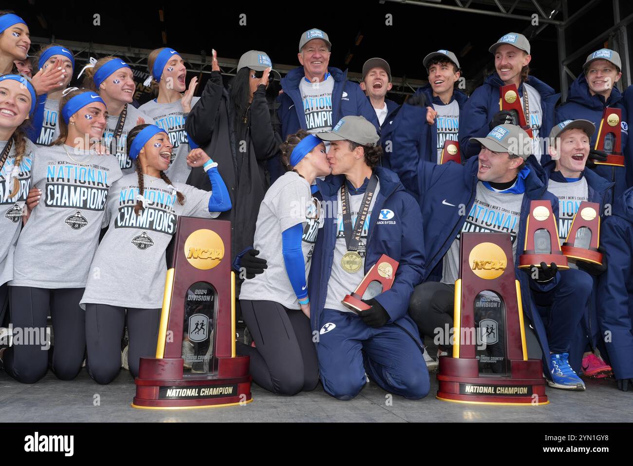 Creed Thompson kisses wife Carlee Hansen after BYU won the men's and ...
