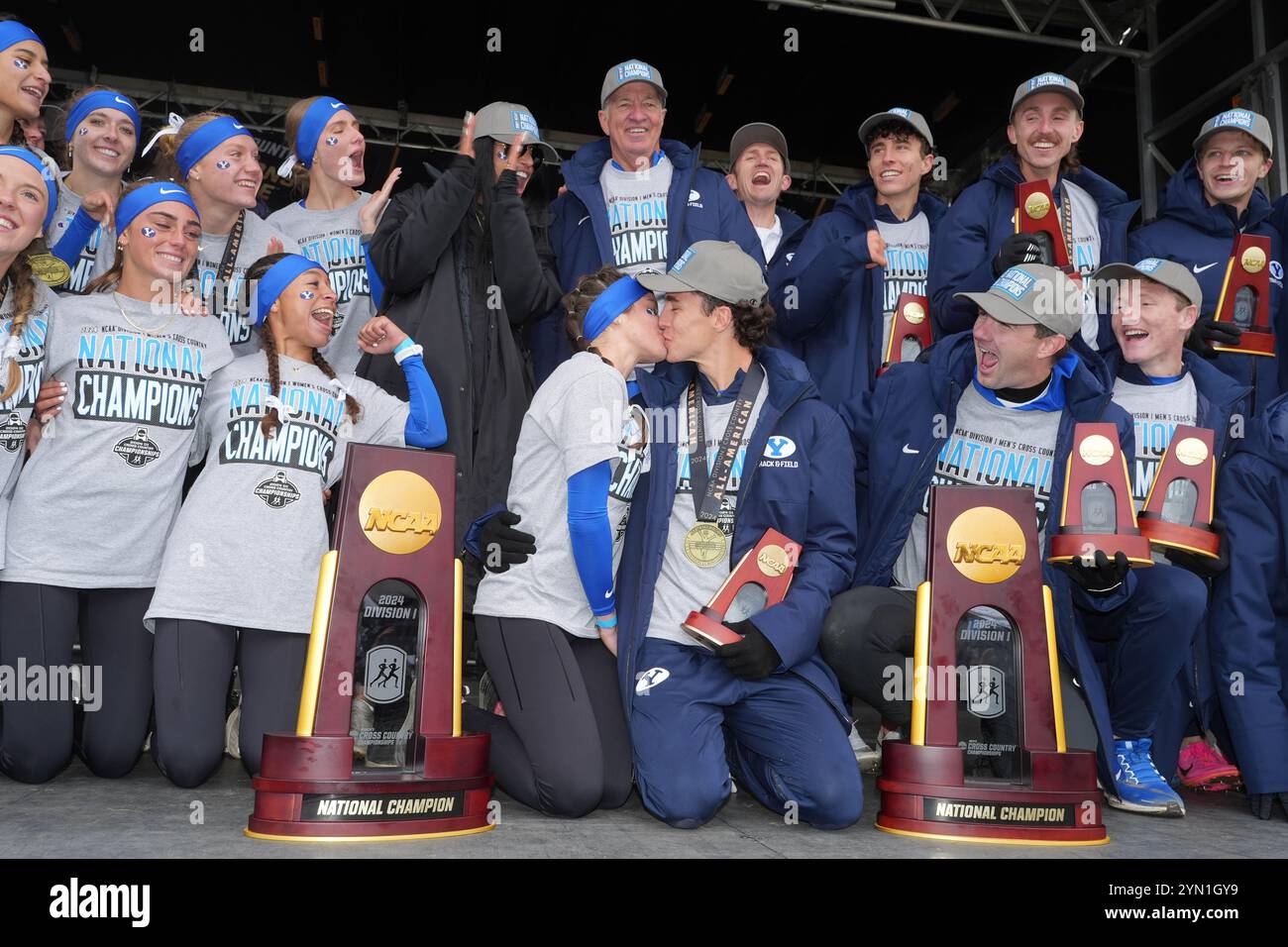 Creed Thompson kisses wife Carlee Hansen after BYU won the men's and ...