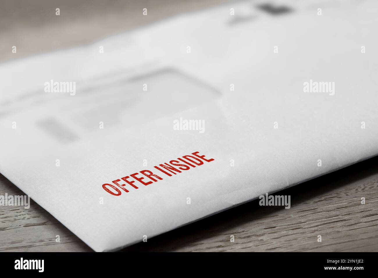 Offer inside letter stamped in red on an envelope. Direct mail ...