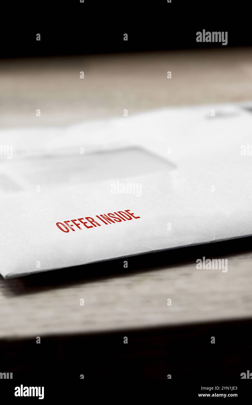 Offer inside letter stamped in red on an envelope. Direct mail ...
