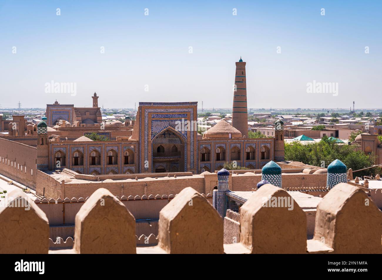 The minaret, arch, and balconies of Muhammad Rahim Khan Madrasah are ...