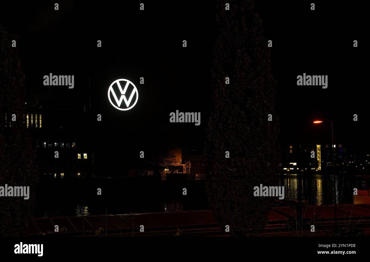 VW Volkswagen illuminated label at the power station of VW plant in ...