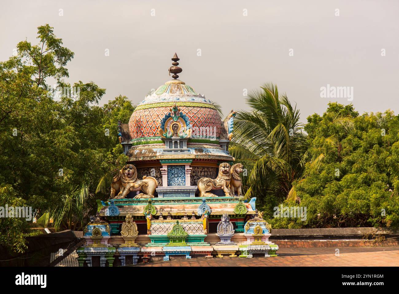 A vividly colorful gopuram of a South Indian temple showcasing ...