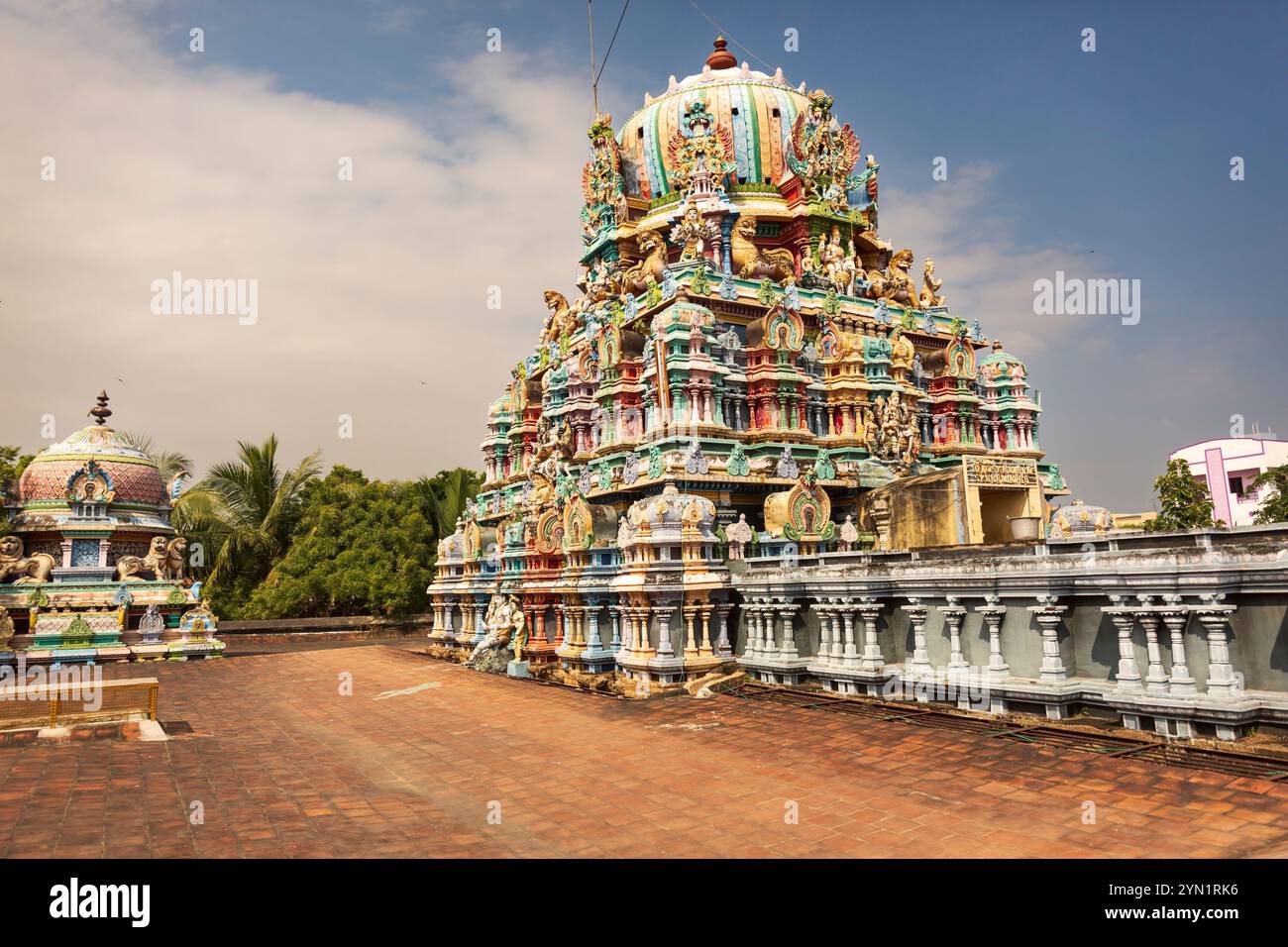 A vividly colorful gopuram of a South Indian temple showcasing ...