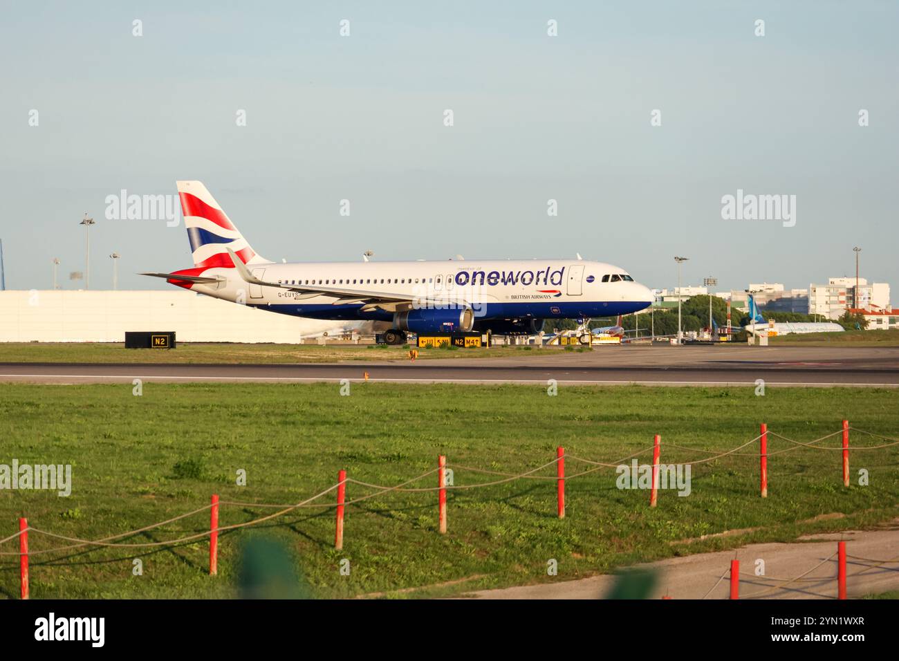 British airways airbus a320 with oneworld livery taxiing at lisbon ...