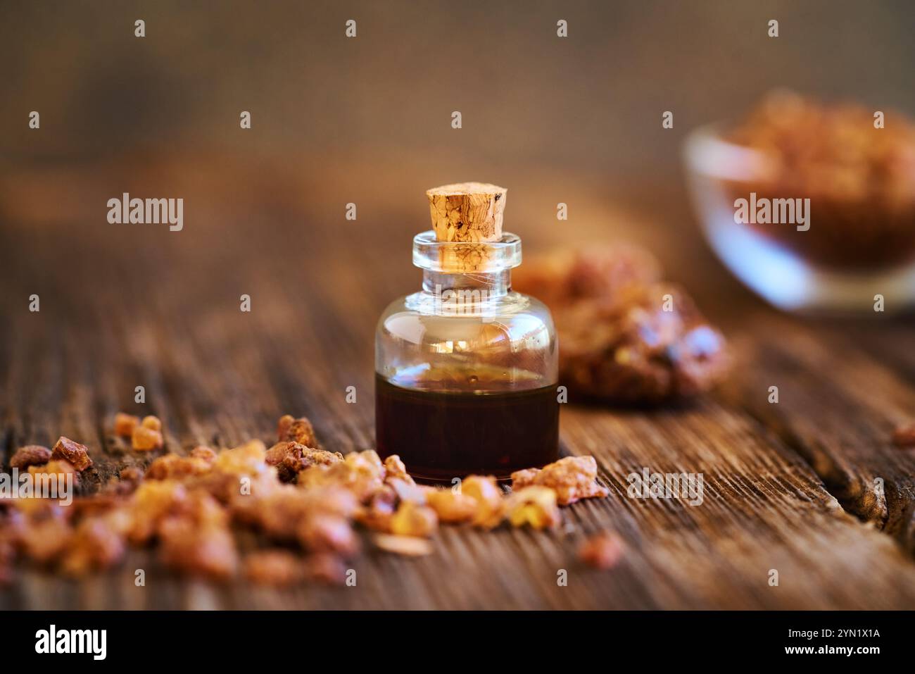 A bottle of myrrh essential oil and resin Stock Photo - Alamy