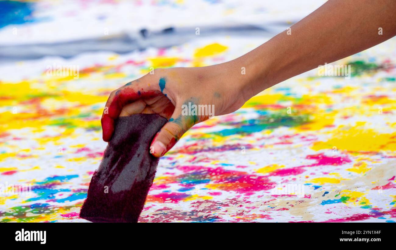 Making splash batik (batik ciprat). Batik is a type of cloth motif ...