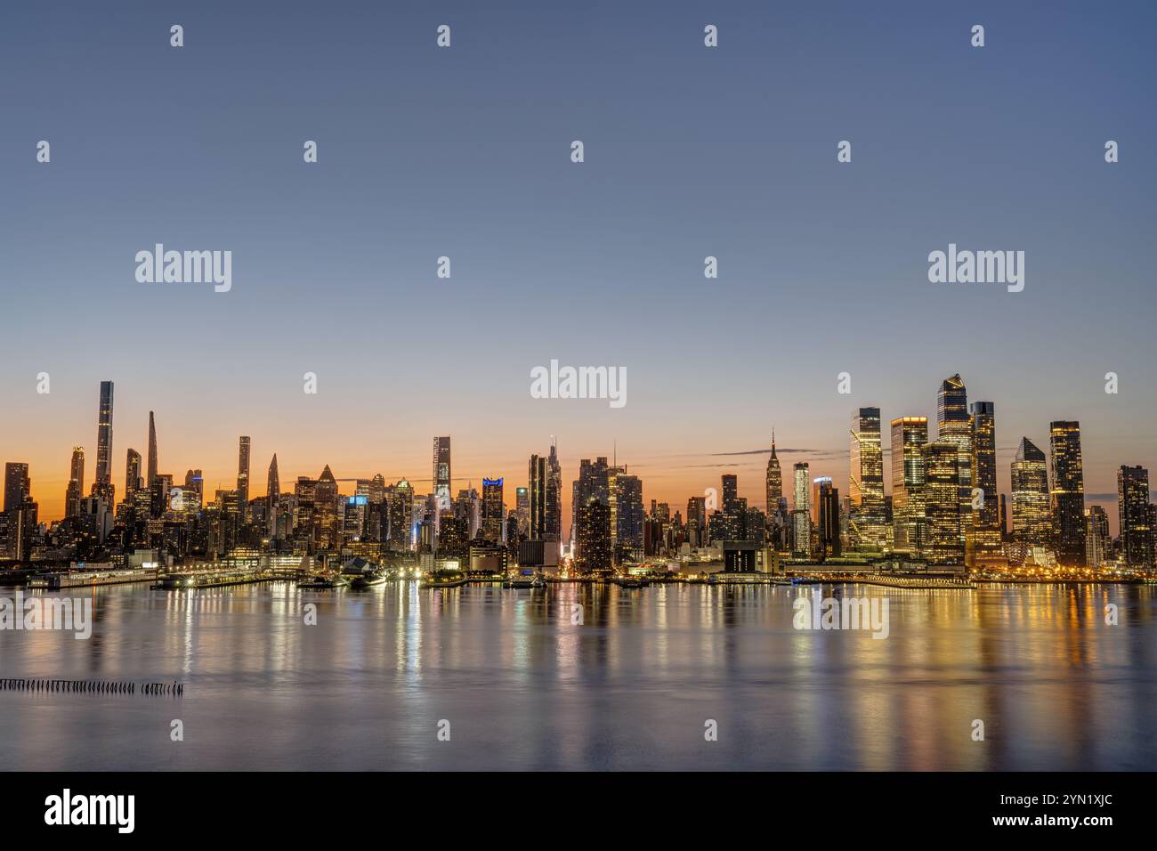 The skyline of Midtown Manhattan in New York before sunrise seen from ...
