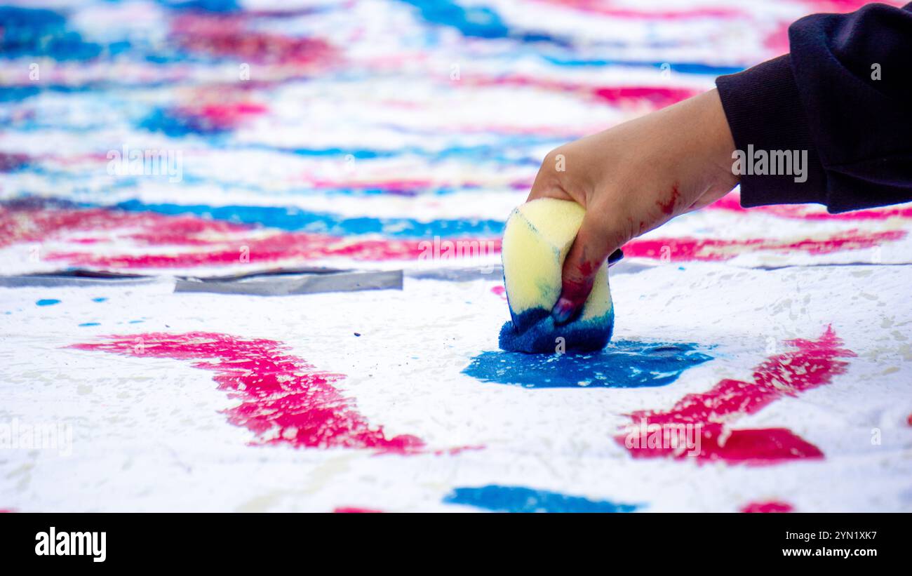 Making splash batik (batik ciprat). Batik is a type of cloth motif ...