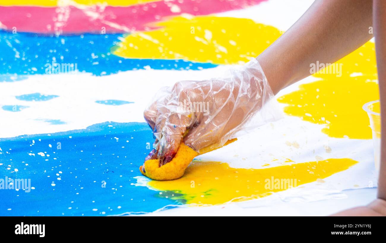 Making splash batik (batik ciprat). Batik is a type of cloth motif ...