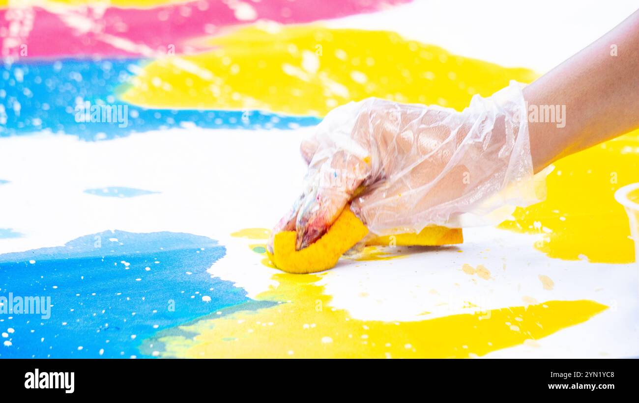 Making splash batik (batik ciprat). Batik is a type of cloth motif ...