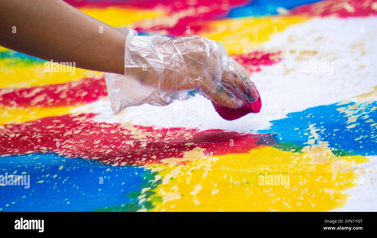 Making splash batik (batik ciprat). Batik is a type of cloth motif ...