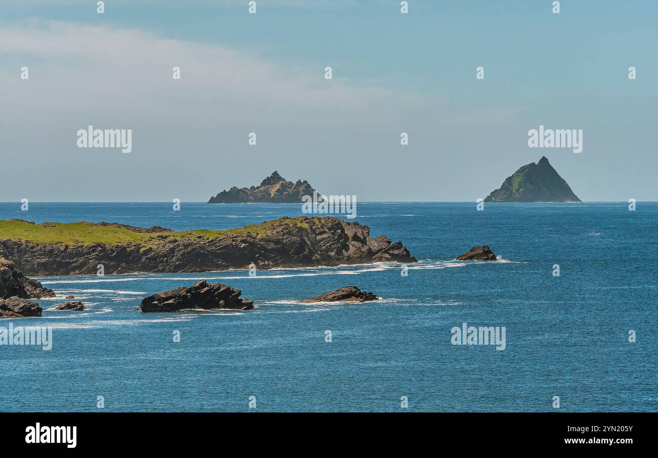 A stunning coastal view showcasingwith the Skellig islands surrounded ...