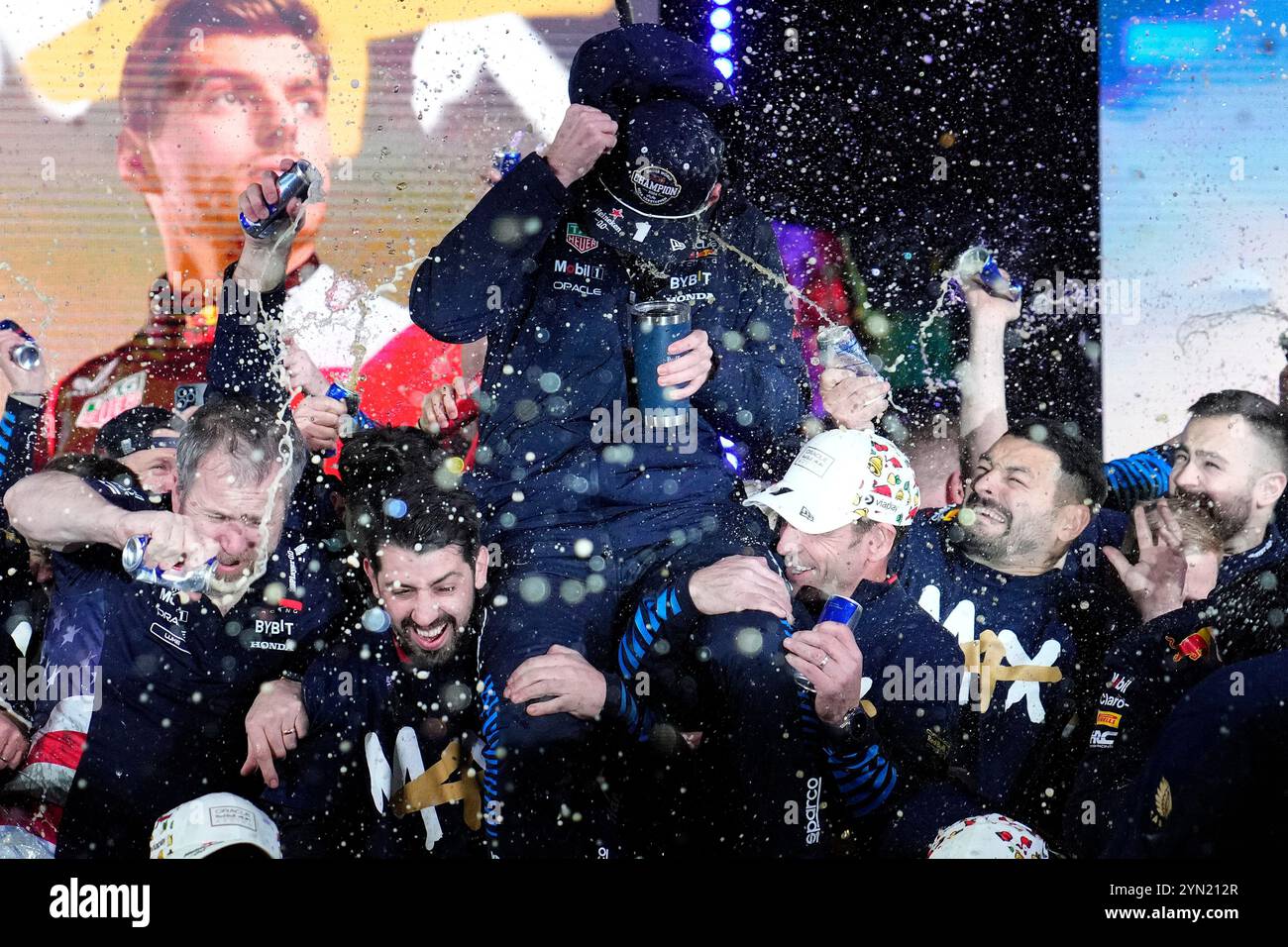 Red Bull driver Max Verstappen, of the Netherlands, center, celebrates ...