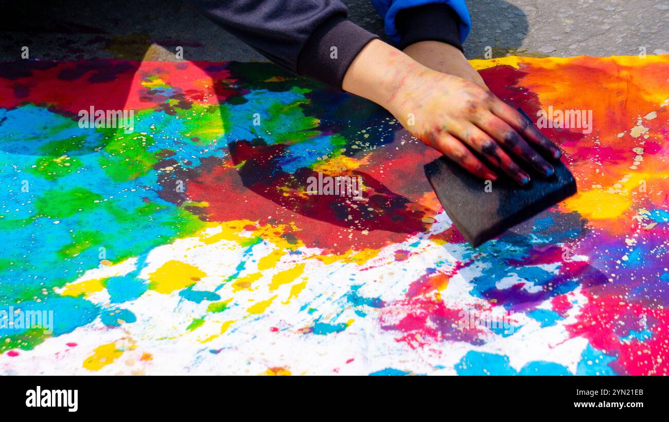 Making splash batik (batik ciprat). Batik is a type of cloth motif ...