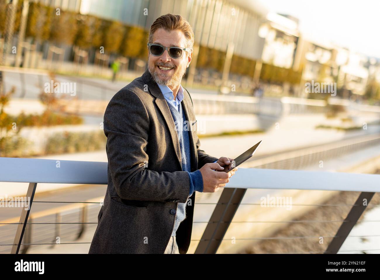 Man sunset stands on balcony hi-res stock photography and images - Alamy