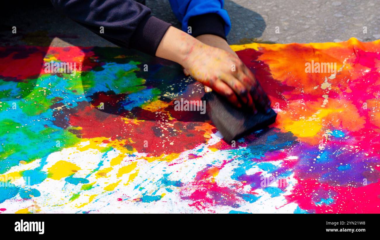 Making splash batik (batik ciprat). Batik is a type of cloth motif ...