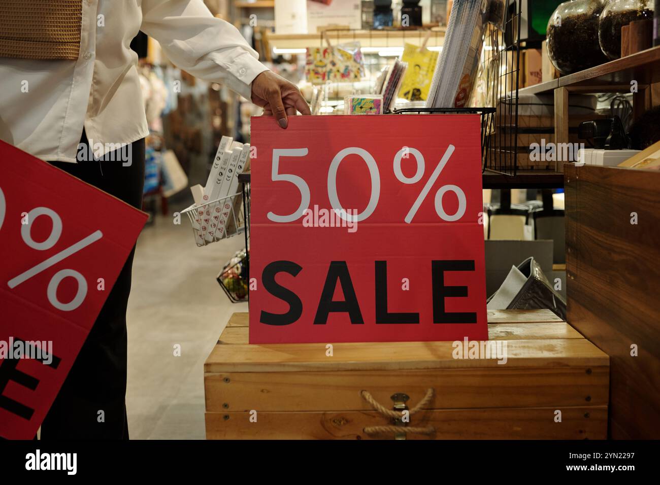 Showing Sale Sign in Store Stock Photo - Alamy