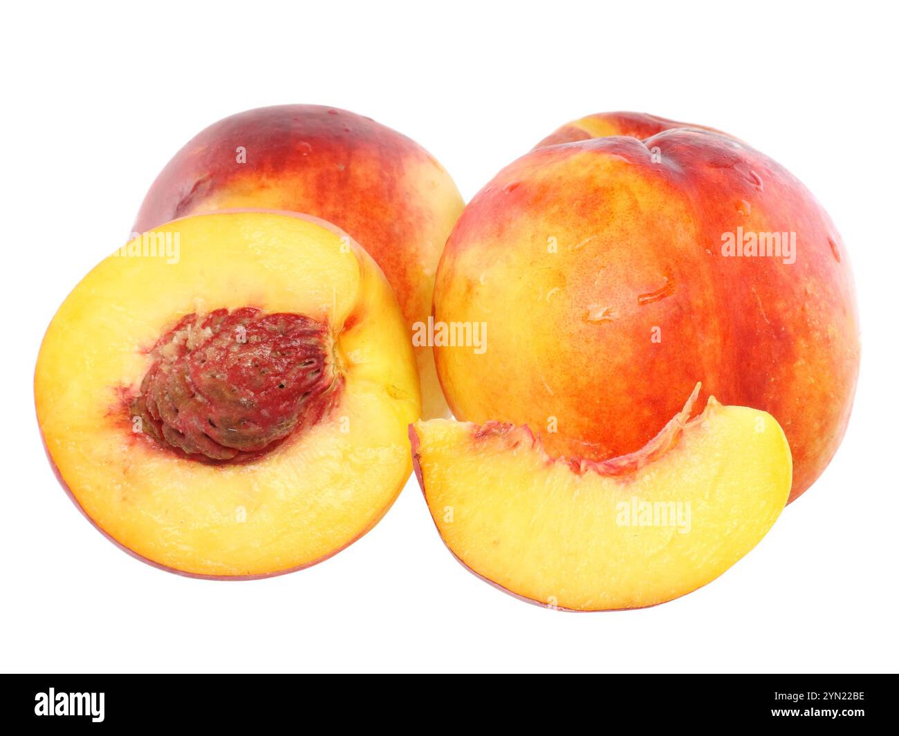 A few peaches with slice of one, on white background. Isolated Stock ...