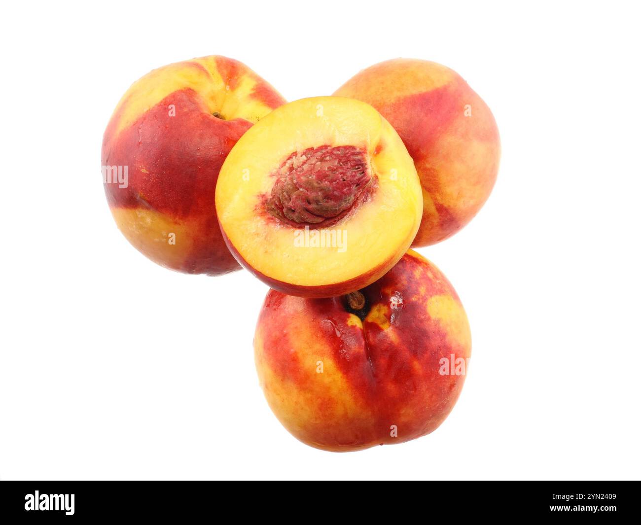 A few peaches with slice of one, on white background. Isolated Stock ...