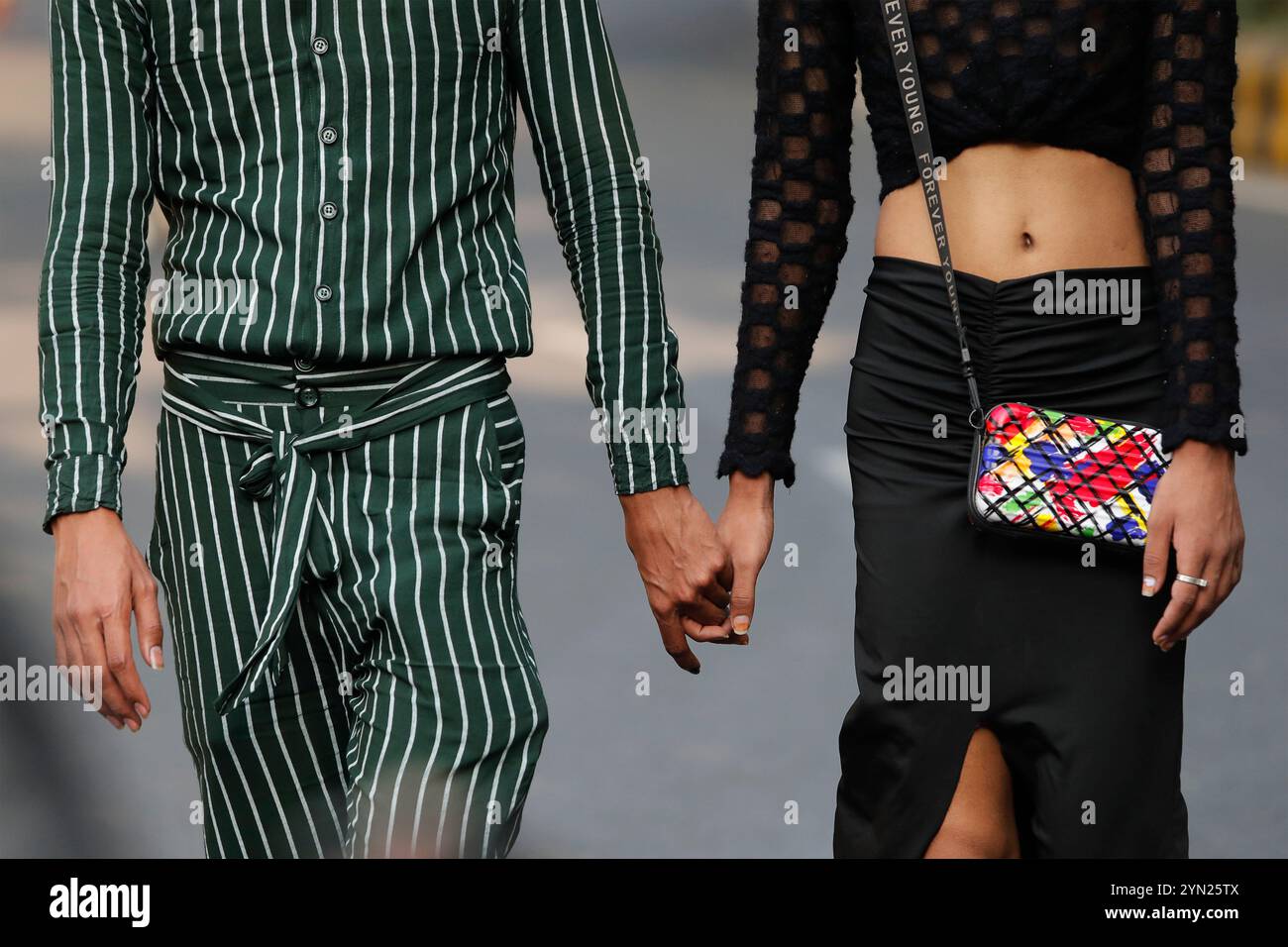 Members of the LGBTQ+ community walk during the annual Delhi Queer ...