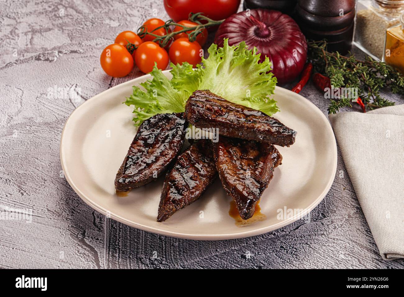 Grilled diet beef liver steak in the plate Stock Photo - Alamy